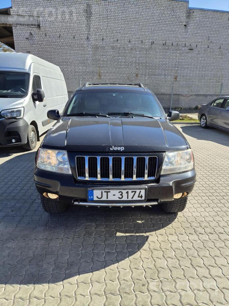 Melns Jeep Grand Cherokee 2004 Rīga, ar dzinēja tilpumu 2.70 L un nobraukumu 231 tūkst. km par 6200 €, foto 3 vietnē AUTOMOTO.COM.LV