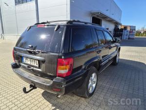 Melns Jeep Grand Cherokee 2004 Rīga, ar dzinēja tilpumu 2.70 L un nobraukumu 231 tūkst. km par 6200 €, foto 5 vietnē AUTOMOTO.COM.LV
