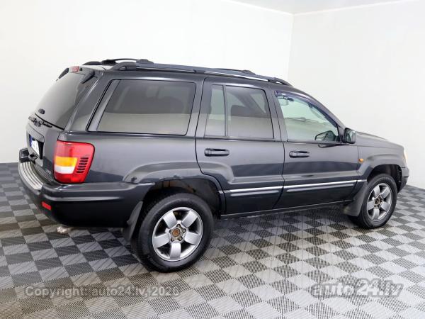 Melns Jeep Grand Cherokee 2004 Tallina, ar dzinēja tilpumu 2.70 L un nobraukumu 379 tūkst. km par 2299 €, foto 3 vietnē AUTOMOTO.COM.LV
