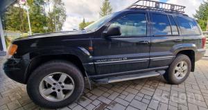 Melns Jeep Grand Cherokee 2004 Rīga, ar dzinēja tilpumu 2.70 L un nobraukumu 126 tūkst. km par 4200 €, foto 4 vietnē AUTOMOTO.COM.LV