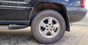 Melns Jeep Grand Cherokee 2004 Rīga, ar dzinēja tilpumu 2.70 L un nobraukumu 126 tūkst. km par 4200 €, foto 10 vietnē AUTOMOTO.COM.LV