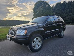 Black Jeep Grand Cherokee 2004 in Vilnius, with an engine capacity of 4.00 L and mileage of 207 thousand km for 2550 €, photo 6 on AUTOMOTO.COM.LV