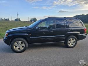 Black Jeep Grand Cherokee 2004 in Vilnius, with an engine capacity of 4.00 L and mileage of 207 thousand km for 2550 €, photo 8 on AUTOMOTO.COM.LV