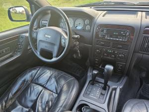 Black Jeep Grand Cherokee 2004 in Vilnius, with an engine capacity of 4.00 L and mileage of 207 thousand km for 2550 €, photo 11 on AUTOMOTO.COM.LV