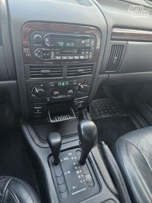 Black Jeep Grand Cherokee 2004 in Vilnius, with an engine capacity of 4.00 L and mileage of 207 thousand km for 2550 €, photo 12 on AUTOMOTO.COM.LV