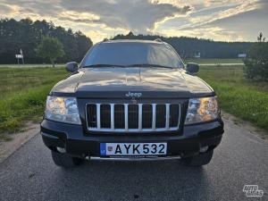 Black Jeep Grand Cherokee 2004 in Vilnius, with an engine capacity of 4.00 L and mileage of 207 thousand km for 2550 €, photo 14 on AUTOMOTO.COM.LV