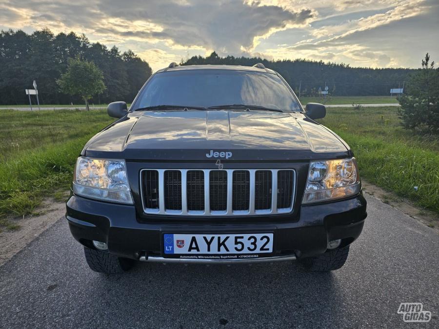 Black Jeep Grand Cherokee 2004 in Vilnius, with an engine capacity of 4.00 L and mileage of 207 thousand km for 2550 €, photo 14 on AUTOMOTO.COM.LV