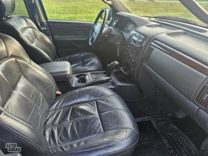 Black Jeep Grand Cherokee 2004 in Vilnius, with an engine capacity of 4.00 L and mileage of 207 thousand km for 2550 €, photo 15 on AUTOMOTO.COM.LV