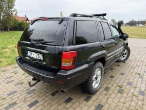 Black Jeep Grand Cherokee 2004 in Riga, with an engine capacity of 2.70 L and mileage of 315 thousand km for 3700 €, photo 6 on AUTOMOTO.COM.LV