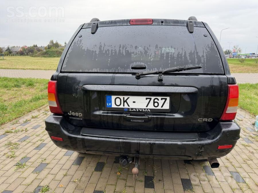 Black Jeep Grand Cherokee 2004 in Riga, with an engine capacity of 2.70 L and mileage of 315 thousand km for 3700 €, photo 7 on AUTOMOTO.COM.LV