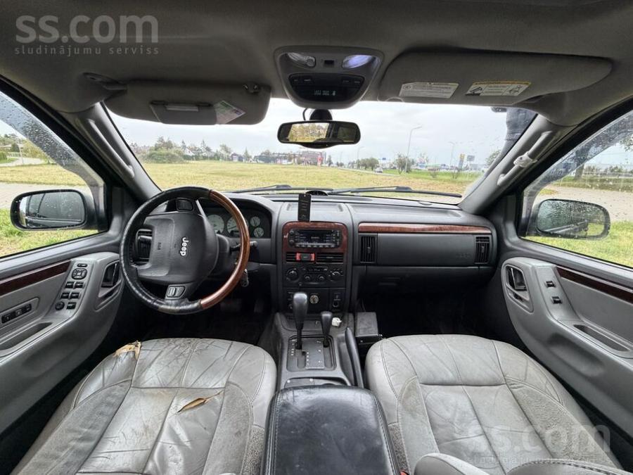 Black Jeep Grand Cherokee 2004 in Riga, with an engine capacity of 2.70 L and mileage of 315 thousand km for 3700 €, photo 11 on AUTOMOTO.COM.LV