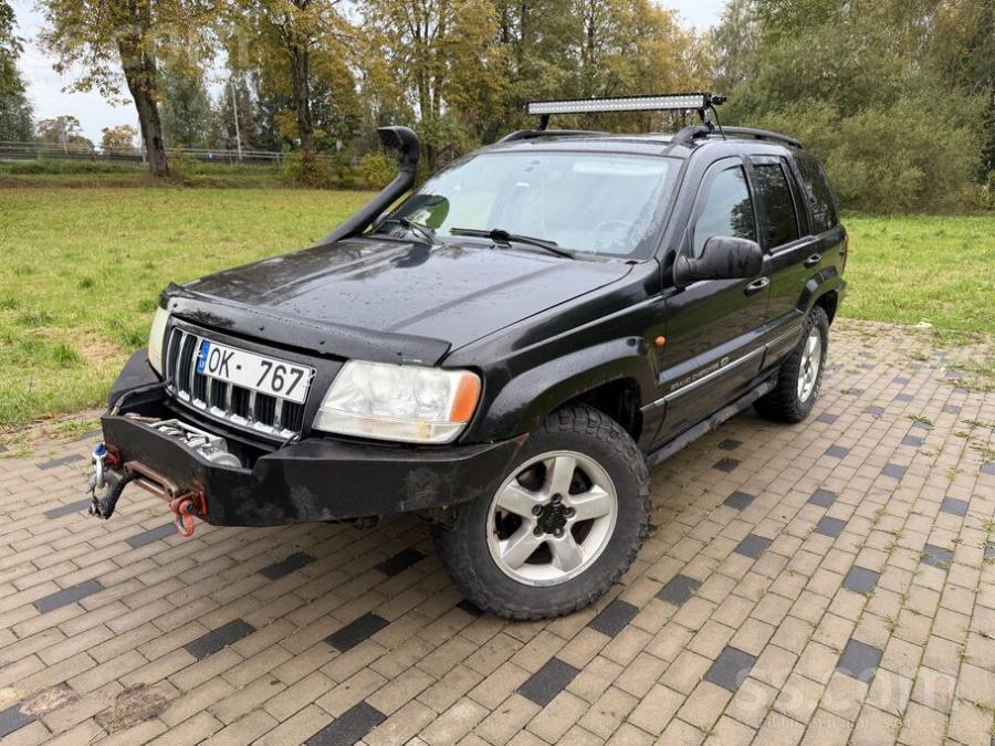 Black Jeep Grand Cherokee 2004 in Riga, with an engine capacity of 2.70 L and mileage of 315 thousand km for 3700 €, photo 13 on AUTOMOTO.COM.LV
