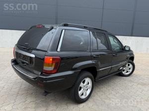 Black Jeep Grand Cherokee 2005 in Riga, with an engine capacity of 2.70 L and mileage of 0 thousand km for 8940 €, photo 7 on AUTOMOTO.COM.LV