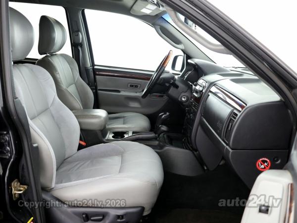 Melns Jeep Grand Cherokee 2005 Tallina, ar dzinēja tilpumu 2.70 L un nobraukumu 191 tūkst. km par 3199 €, foto 6 vietnē AUTOMOTO.COM.LV