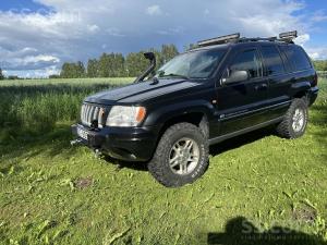 Melns Jeep Grand Cherokee 2005 Rīga, ar dzinēja tilpumu 2.70 L un nobraukumu 323 tūkst. km par 3900 €, foto 3 vietnē AUTOMOTO.COM.LV