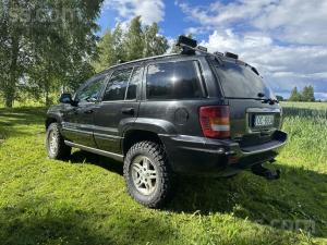 Melns Jeep Grand Cherokee 2005 Rīga, ar dzinēja tilpumu 2.70 L un nobraukumu 323 tūkst. km par 3900 €, foto 4 vietnē AUTOMOTO.COM.LV