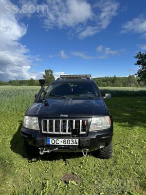 Melns Jeep Grand Cherokee 2005 Rīga, ar dzinēja tilpumu 2.70 L un nobraukumu 323 tūkst. km par 3900 €, foto 6 vietnē AUTOMOTO.COM.LV