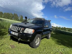 Melns Jeep Grand Cherokee 2005 Rīga, ar dzinēja tilpumu 2.70 L un nobraukumu 323 tūkst. km par 3900 €, foto 7 vietnē AUTOMOTO.COM.LV