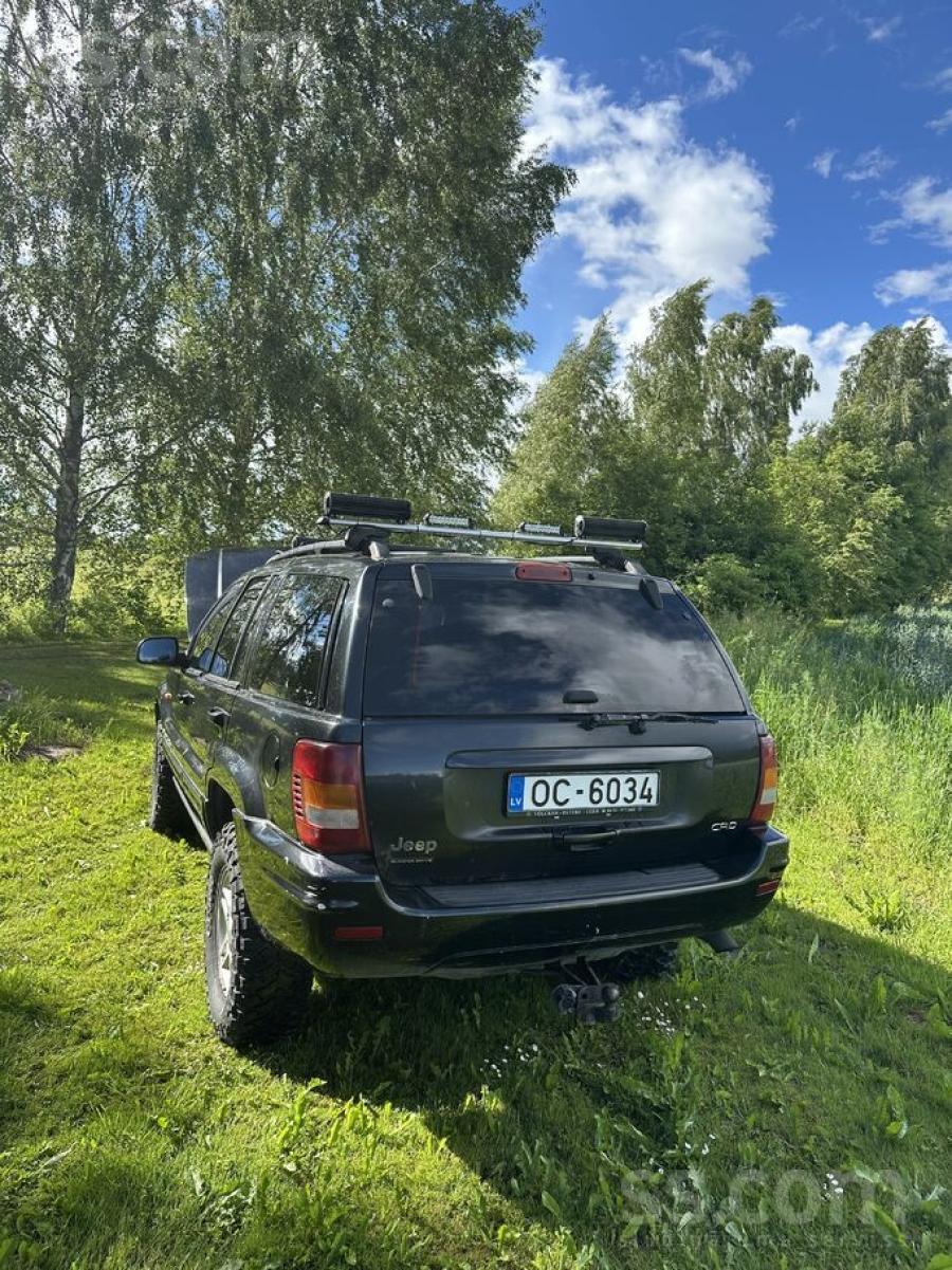 Melns Jeep Grand Cherokee 2005 Rīga, ar dzinēja tilpumu 2.70 L un nobraukumu 323 tūkst. km par 3900 €, foto 13 vietnē AUTOMOTO.COM.LV