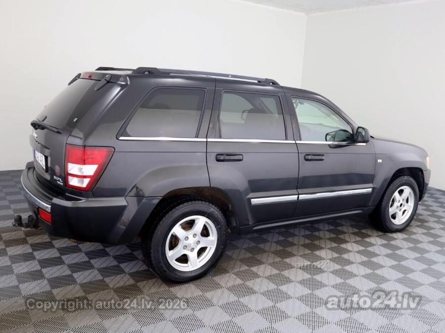 Melns Jeep Grand Cherokee 2006 Tallina, ar dzinēja tilpumu 5.70 L un nobraukumu 254 tūkst. km par 2499 €, foto 3 vietnē AUTOMOTO.COM.LV