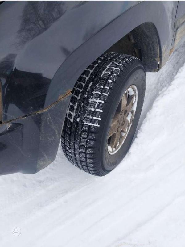 Black Jeep Grand Cherokee 2006 in Vilnius, with an engine capacity of 4.70 L and mileage of 410 thousand km for 2600 €, photo 6 on AUTOMOTO.COM.LV