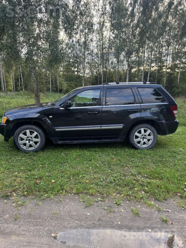 Melns Jeep Grand Cherokee 2007 Rīga, ar dzinēja tilpumu 3.00 L un nobraukumu 400 tūkst. km par 3700 €, foto 1 vietnē AUTOMOTO.COM.LV