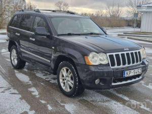 Black Jeep Grand Cherokee 2009 in Riga, with an engine capacity of 3.00 L and mileage of 330 thousand km for 4650 €, photo 2 on AUTOMOTO.COM.LV