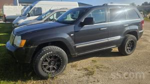 Black Jeep Grand Cherokee 2009 in Dobele, with an engine capacity of 3.00 L and mileage of 378 thousand km for 9800 €, photo  on AUTOMOTO.COM.LV
