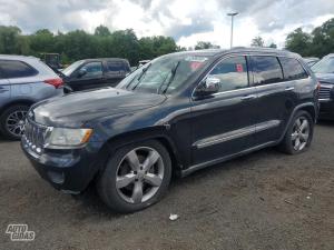 Black Jeep Grand Cherokee 2010 in Alytus, with an engine capacity of 5.70 L and mileage of 200 thousand km for 5300 €, photo  on AUTOMOTO.COM.LV