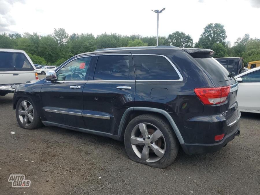 Black Jeep Grand Cherokee 2010 in Alytus, with an engine capacity of 5.70 L and mileage of 200 thousand km for 5300 €, photo 3 on AUTOMOTO.COM.LV