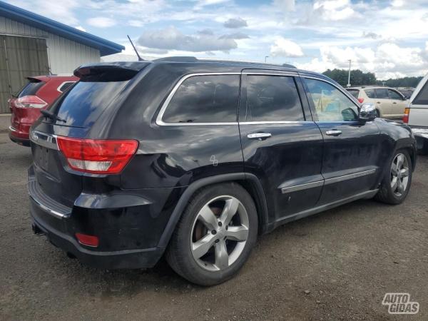 Black Jeep Grand Cherokee 2010 in Alytus, with an engine capacity of 5.70 L and mileage of 200 thousand km for 5300 €, photo 3 on AUTOMOTO.COM.LV
