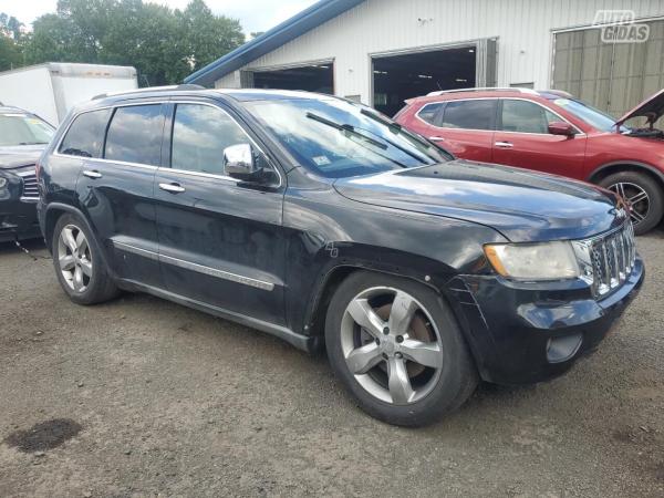 Black Jeep Grand Cherokee 2010 in Alytus, with an engine capacity of 5.70 L and mileage of 200 thousand km for 5300 €, photo 4 on AUTOMOTO.COM.LV
