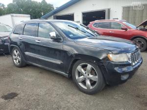 Black Jeep Grand Cherokee 2010 in Alytus, with an engine capacity of 5.70 L and mileage of 200 thousand km for 5300 €, photo 5 on AUTOMOTO.COM.LV