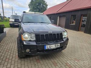 Melns Jeep Grand Cherokee 2010 Liepāja, ar dzinēja tilpumu 3.00 L un nobraukumu 370 tūkst. km par 3800 €, foto  vietnē AUTOMOTO.COM.LV