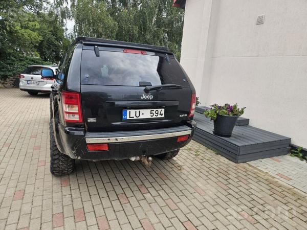 Jeep Grand Cherokee 2010 Liepāja vietnē Melns Jeep Grand Cherokee 2010 Liepāja, ar dzinēja tilpumu 3.00 L un nobraukumu 370 tūkst. km par 3800 €, foto 5 vietnē AUTOMOTO.COM.LV