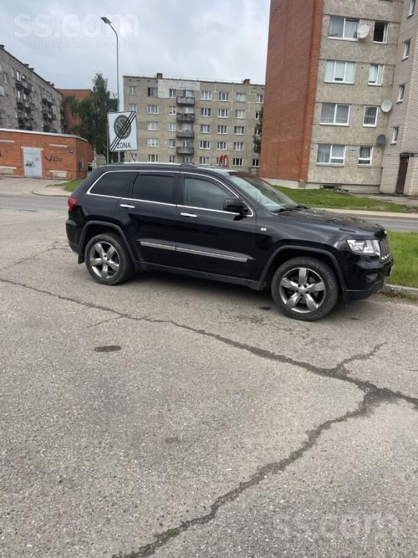 Melns Jeep Grand Cherokee 2011 Rēzekne, ar dzinēja tilpumu 3.00 L un nobraukumu 271 tūkst. km par 8000 €, foto 2 vietnē AUTOMOTO.COM.LV