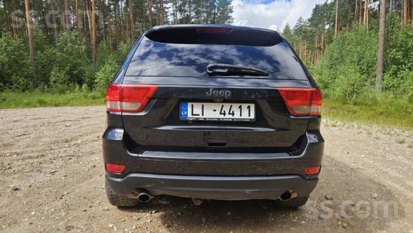 Melns Jeep Grand Cherokee 2011 Jelgava, ar dzinēja tilpumu 3.00 L un nobraukumu 302 tūkst. km par 7800 €, foto 4 vietnē AUTOMOTO.COM.LV
