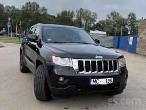 Melns Jeep Grand Cherokee 2011 Rīga, ar dzinēja tilpumu 3.60 L un nobraukumu 286 tūkst. km par 9300 €, foto  vietnē AUTOMOTO.COM.LV