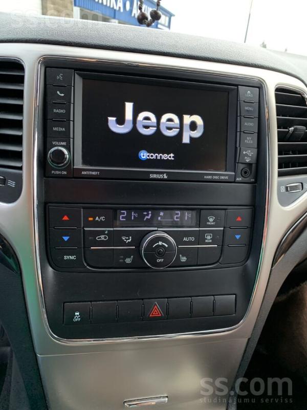 Black Jeep Grand Cherokee 2011 in Riga, with an engine capacity of 3.60 L and mileage of 286 thousand km for 9300 €, photo 5 on AUTOMOTO.COM.LV