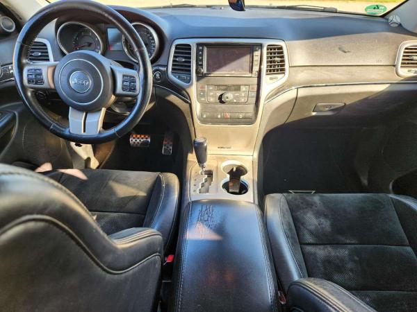 Black Jeep Grand Cherokee 2012 in Kaunas, with an engine capacity of 2.99 L and mileage of 234 thousand km for 6400 €, photo 11 on AUTOMOTO.COM.LV