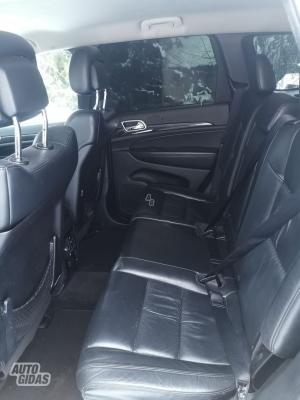 Black Jeep Grand Cherokee 2012 in Plunge, with an engine capacity of 5.70 L and mileage of 215 thousand km for 8500 €, photo 10 on AUTOMOTO.COM.LV