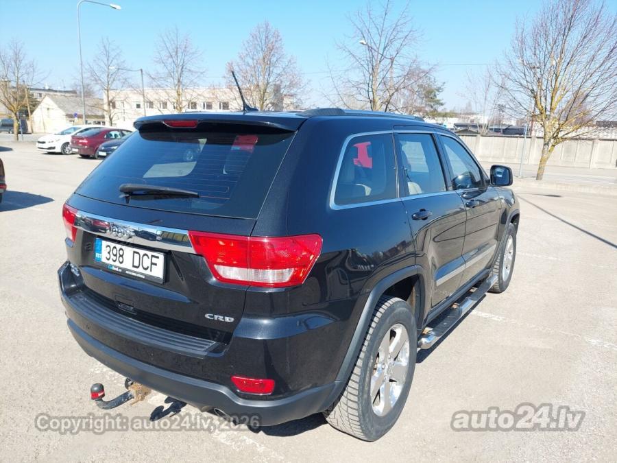 Black Jeep Grand Cherokee 2012 in Tallinn, with an engine capacity of 3.00 L and mileage of 425 thousand km for 7999 €, photo 4 on AUTOMOTO.COM.LV