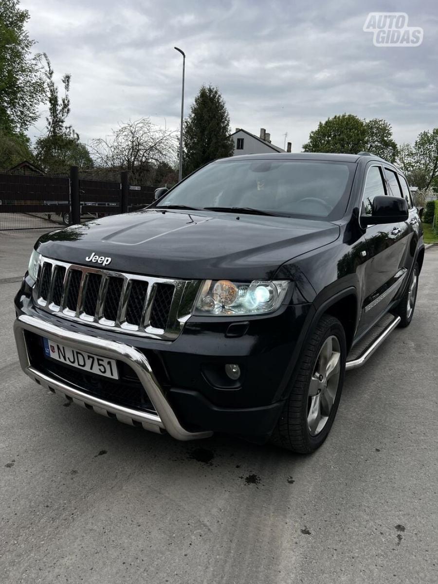 Melns Jeep Grand Cherokee 2012 Viļņa, ar dzinēja tilpumu 3.00 L un nobraukumu 254 tūkst. km par 10300 €, foto 1 vietnē AUTOMOTO.COM.LV