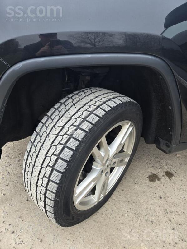 Black Jeep Grand Cherokee 2012 in Riga, with an engine capacity of 3.00 L and mileage of 318 thousand km for 9500 €, photo 8 on AUTOMOTO.COM.LV