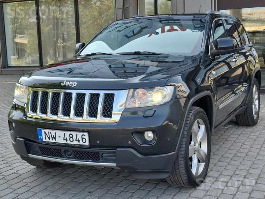 Black Jeep Grand Cherokee 2012 in Riga, with an engine capacity of 3.00 L and mileage of 260 thousand km for 8950 €, photo 1 on AUTOMOTO.COM.LV