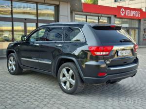 Black Jeep Grand Cherokee 2012 in Riga, with an engine capacity of 3.00 L and mileage of 260 thousand km for 8950 €, photo 9 on AUTOMOTO.COM.LV