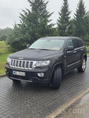 Melns Jeep Grand Cherokee 2012 Rīga, ar dzinēja tilpumu 3.00 L un nobraukumu 170 tūkst. km par 13000 €, foto  vietnē AUTOMOTO.COM.LV