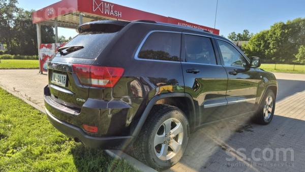Melns Jeep Grand Cherokee 2012 Dobele, ar dzinēja tilpumu 3.00 L un nobraukumu 290 tūkst. km par 8000 €, foto 2 vietnē AUTOMOTO.COM.LV
