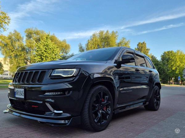 Black Jeep Grand Cherokee 2012 in Silute, with an engine capacity of 6.40 L and mileage of 245 thousand km for 16450 €, photo 4 on AUTOMOTO.COM.LV