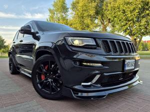 Black Jeep Grand Cherokee 2012 in Silute, with an engine capacity of 6.40 L and mileage of 245 thousand km for 15999 €, photo  on AUTOMOTO.COM.LV
